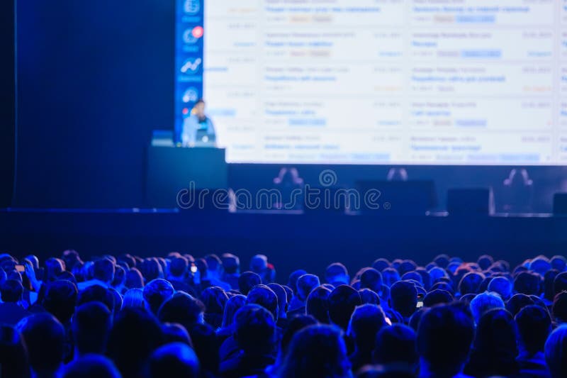 Business Crowd Attending Global Presentation in Blue Auditorium Stock ...