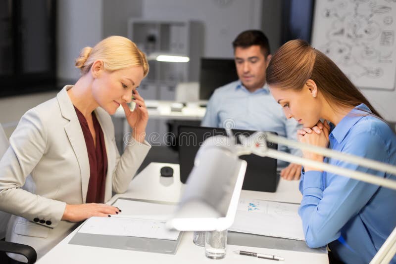 Business Team with Laptop Working Late at Office Stock Image - Image of ...