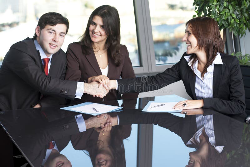 Business deal stock image. Image of handshake, businesswoman - 23000827