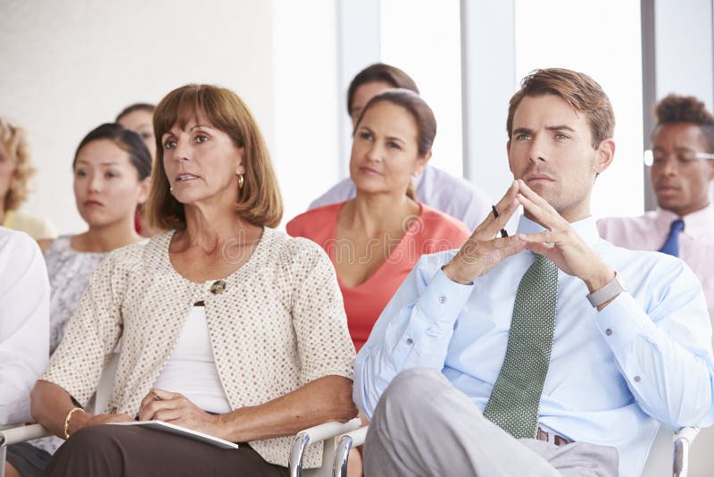 Business Delegates Listening To Presentation at Conference Stock Photo ...