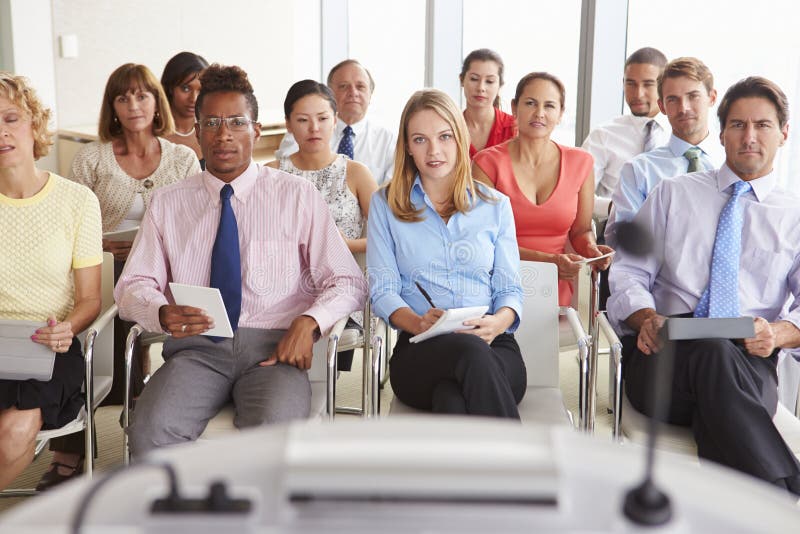Business Delegates Listening To Presentation at Conference Stock Photo ...
