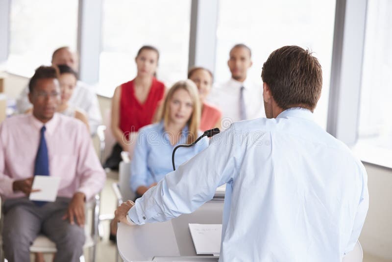 Business Delegates Listening To Presentation at Conference Stock Photo ...