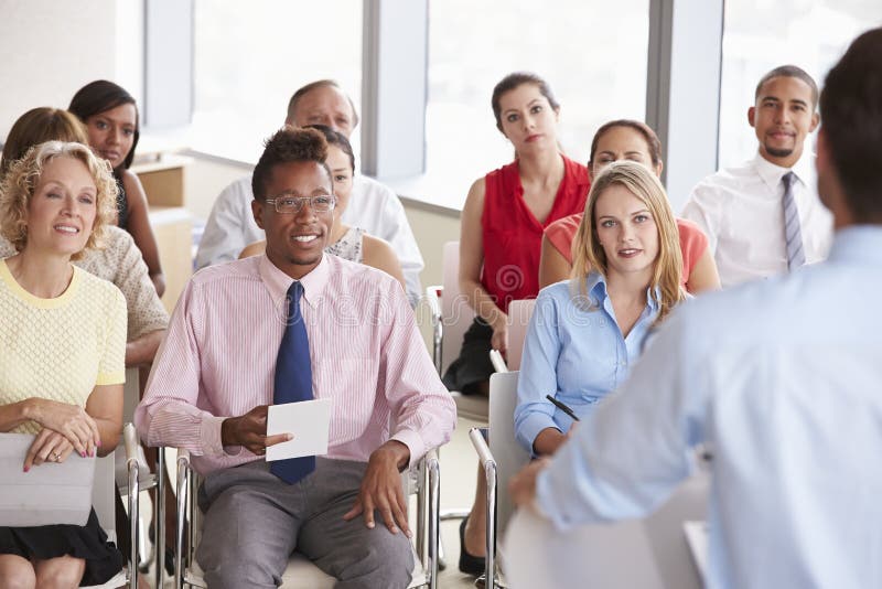 Business Delegates Listening To Presentation at Conference Stock Photo ...