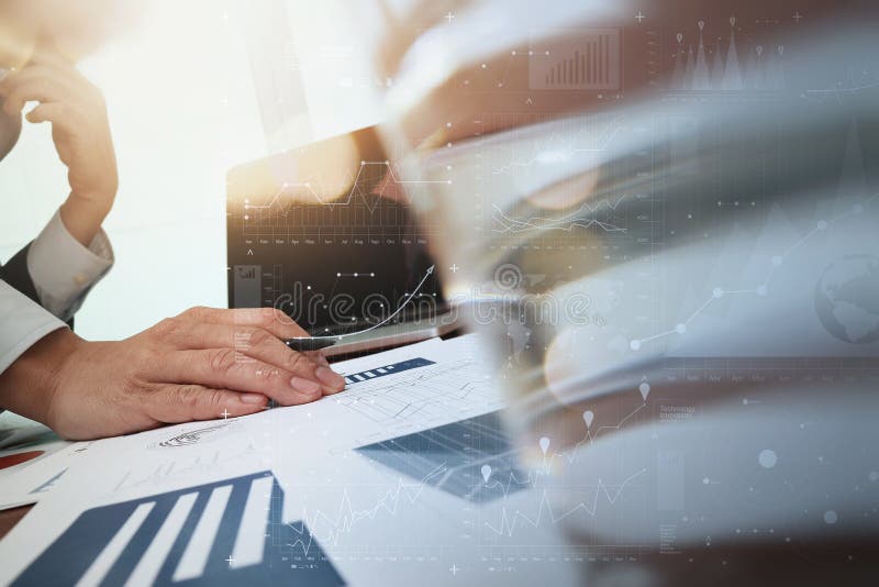 Business Documents on Office Table and Laptop Computer and Graph Stock ...