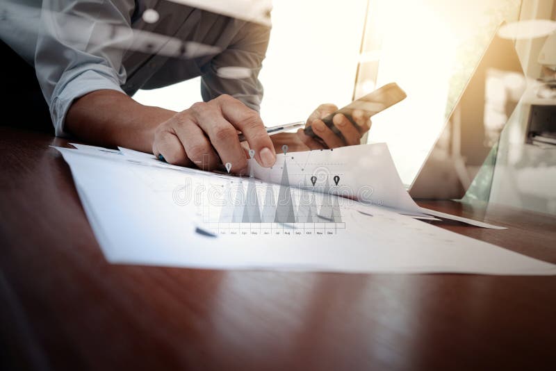 Business Documents on Office Table with Smart Phone and Laptop Stock ...