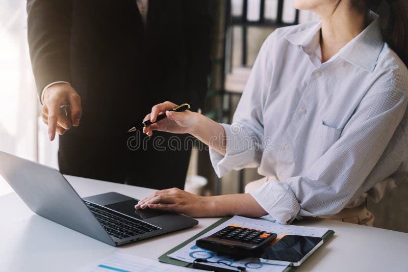 Business Documents on Office Table with Tablet and Laptop Computer and ...