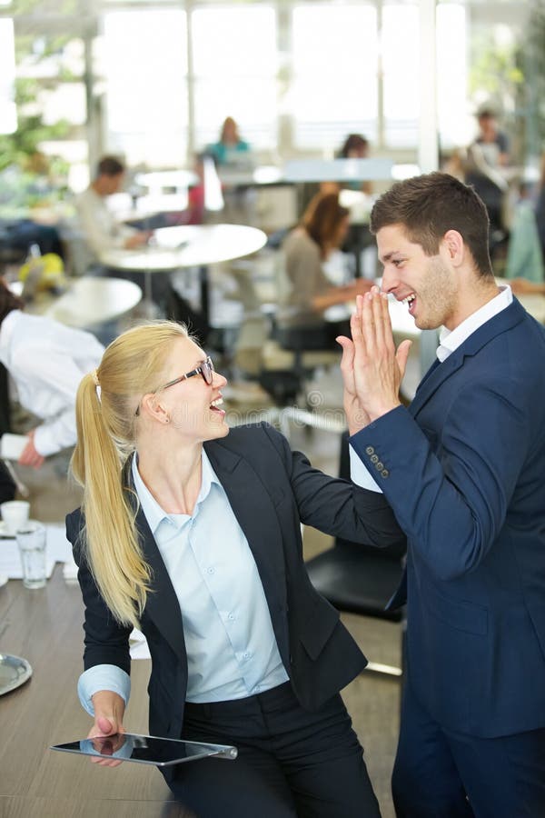 Business Duo Gives High Five in the Office Stock Image - Image of ...