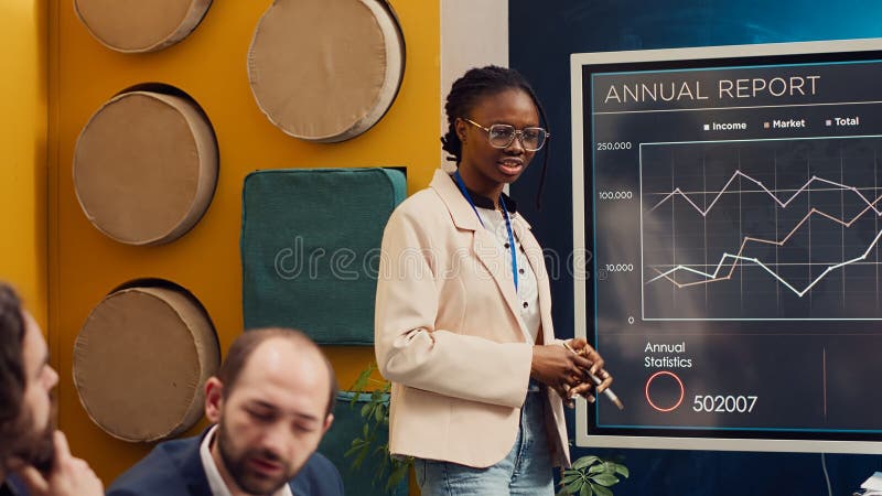 Business Employee Doing a Presentation with Project Updates and ...