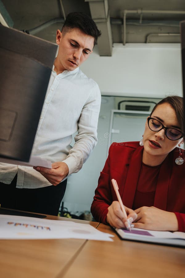 Business Employees Collaborating on Project Ideas in a Modern Office ...