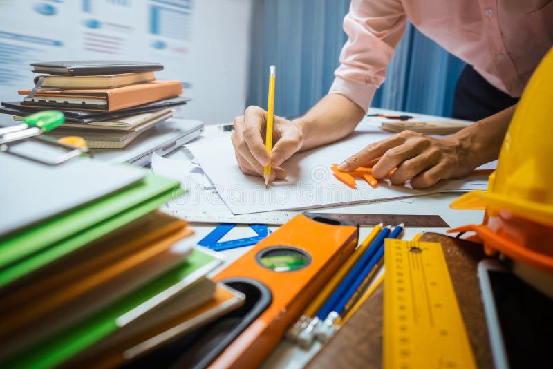 Business Engineer Contractor Working at His Desk Table in Office Stock ...