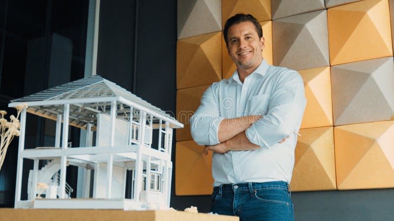 Business Engineer Looking at Camera while Standing with Arm Folded ...