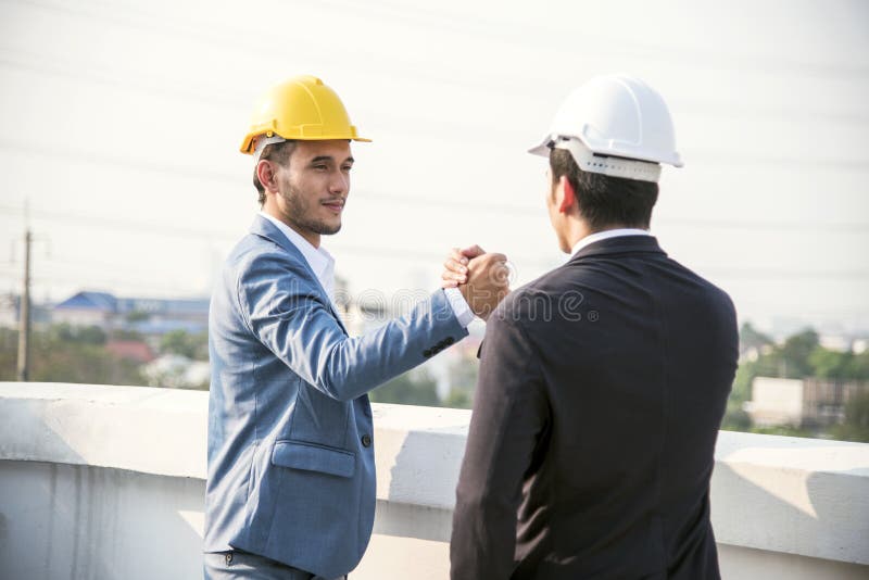 Business Engineer Partner Handshake between Join New Project. Stock ...