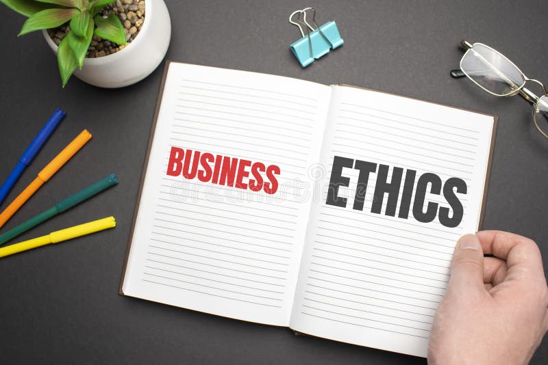 Business Ethics Text on the Notebook with Businessman& X27;s Hands ...