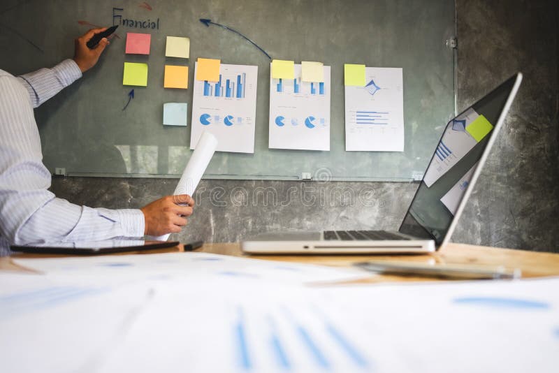 Business Executive Making Presentation To Colleagues in Office, Stock ...