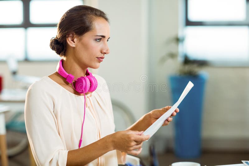 Business Executive Reading a Document Stock Photo - Image of beautiful ...