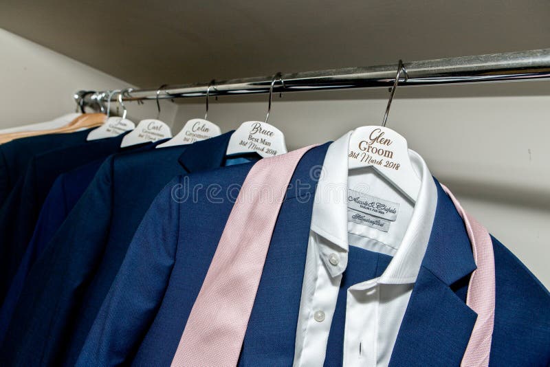 Business Executive Suits Hanging Wall Stock Photos - Free & Royalty ...