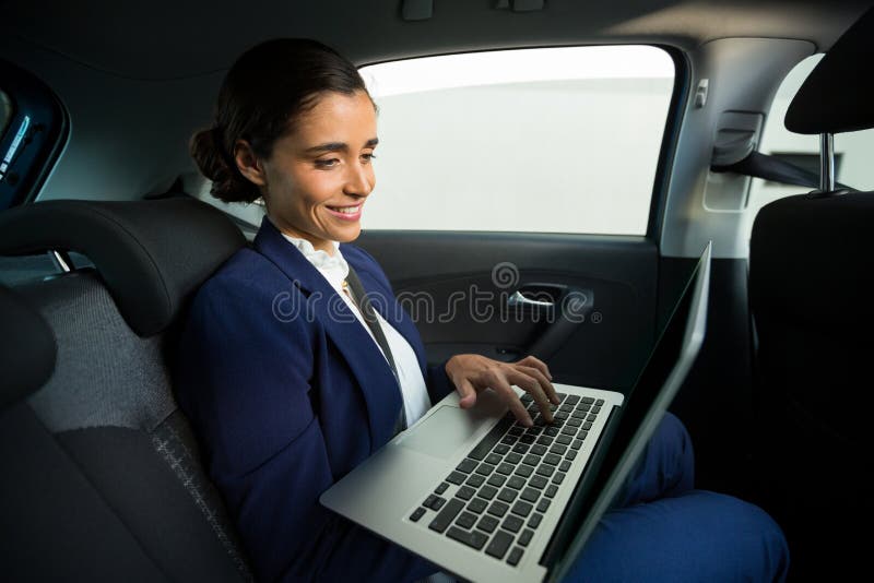 Business Executive Using Laptop in Car Stock Image - Image of browsing ...