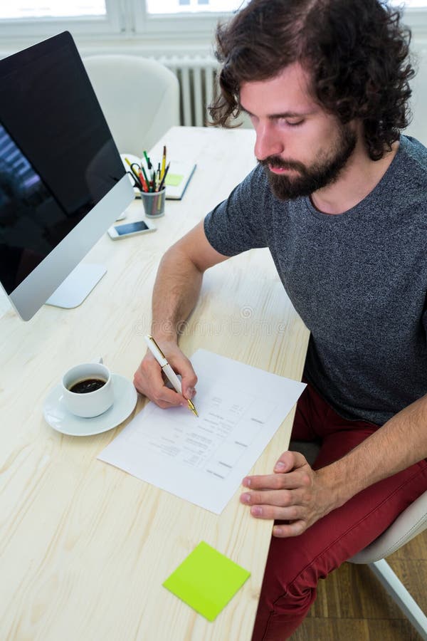 Business Executive Writing on a Document Stock Photo - Image of ...