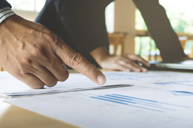 Business Executives Analysis Data Document with Accountant at Workplace ...