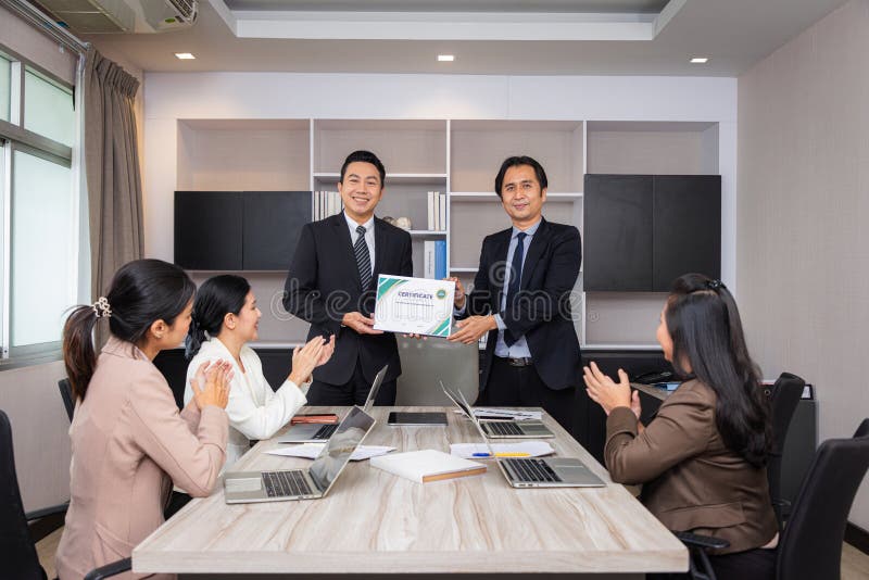 Business Executives Congratulate Employees on Their Excellent Work ...