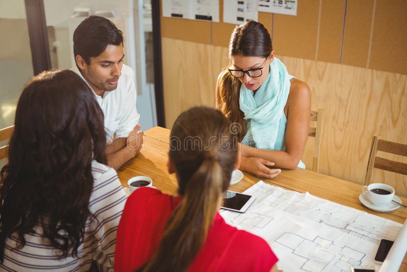 Business Executives Having Discussion during Meeting Stock Photo ...