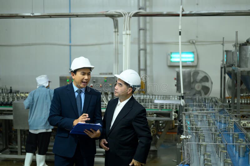Business Executives Inspecting Food Production Line Inside a Modern ...