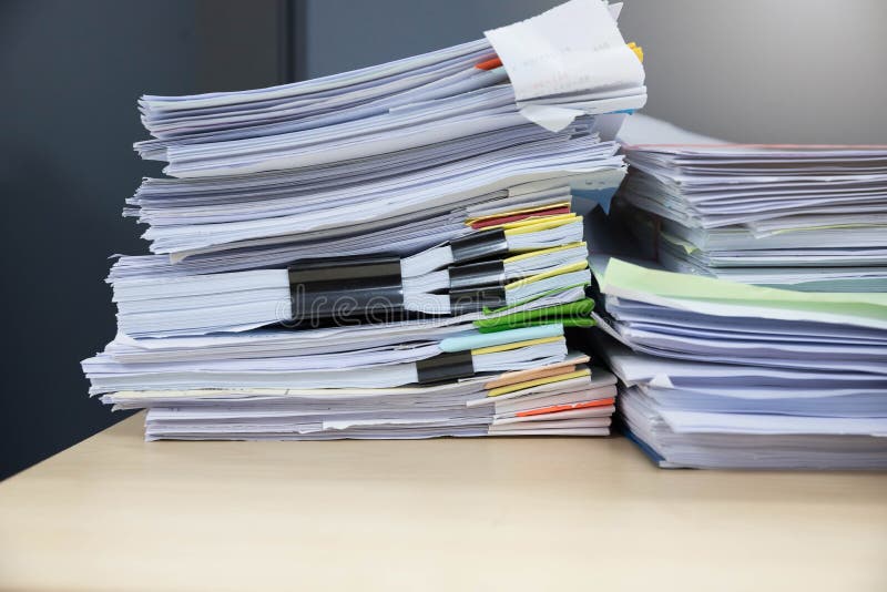 Business and Finance Concept of Office Working, Pile of Unfinished ...