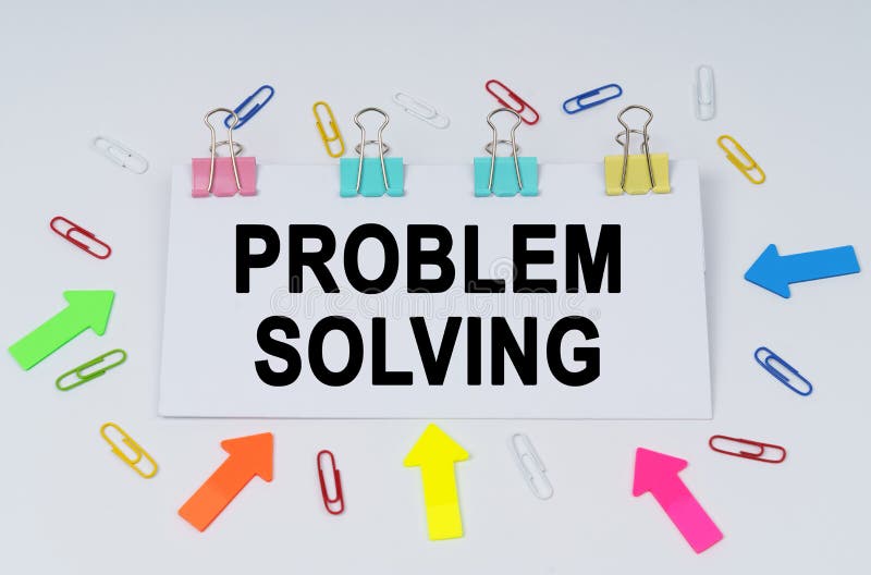 On the Table There are Paper Clips and Directional Arrows, a Sign that ...