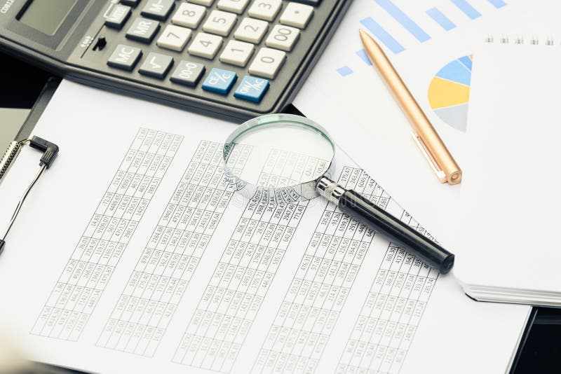 Business Financial Documents, Office Calculator and Pen on the Table ...