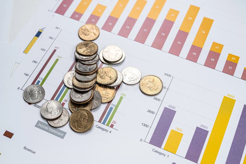 Business Graph or Chart Document with Stack Coins Money on Office Desk ...