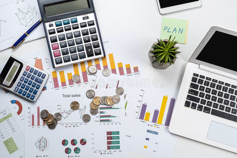 Business Graph or Chart Document with Stack Coins Money on Office Desk ...