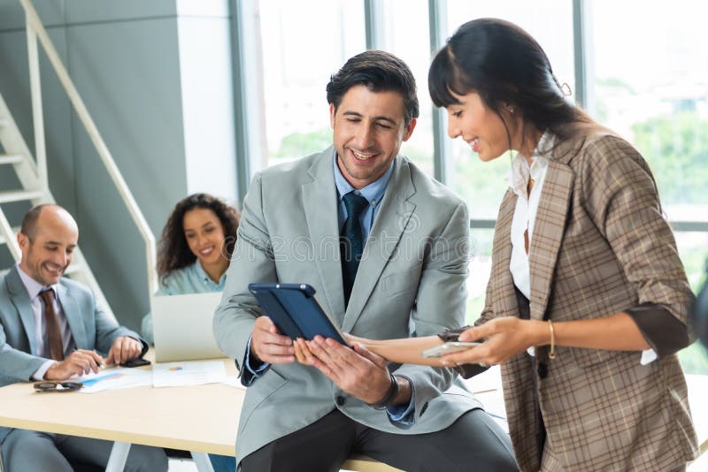 Business Group with the Creative Work, Talk and Exchange Ideas Shared ...