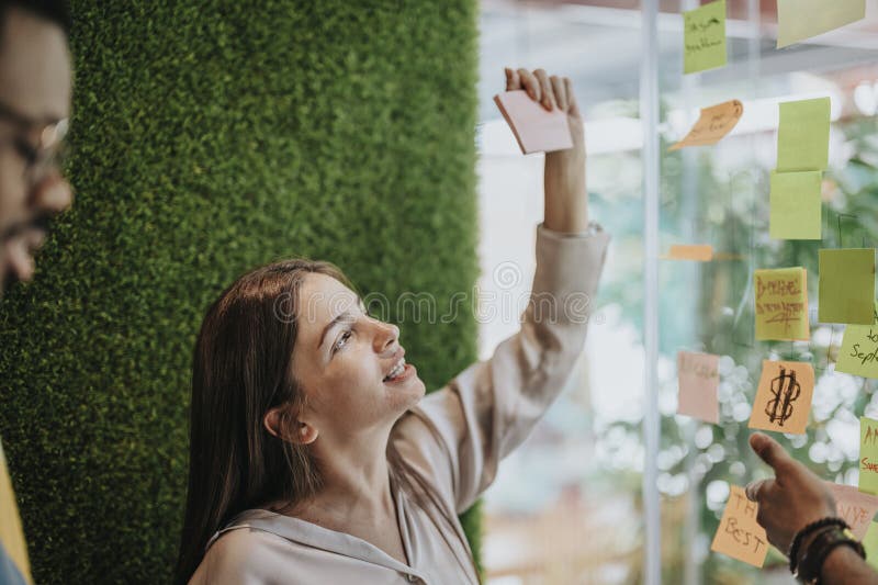 Diverse Business Group Brainstorming and Discussing Ideas in a ...