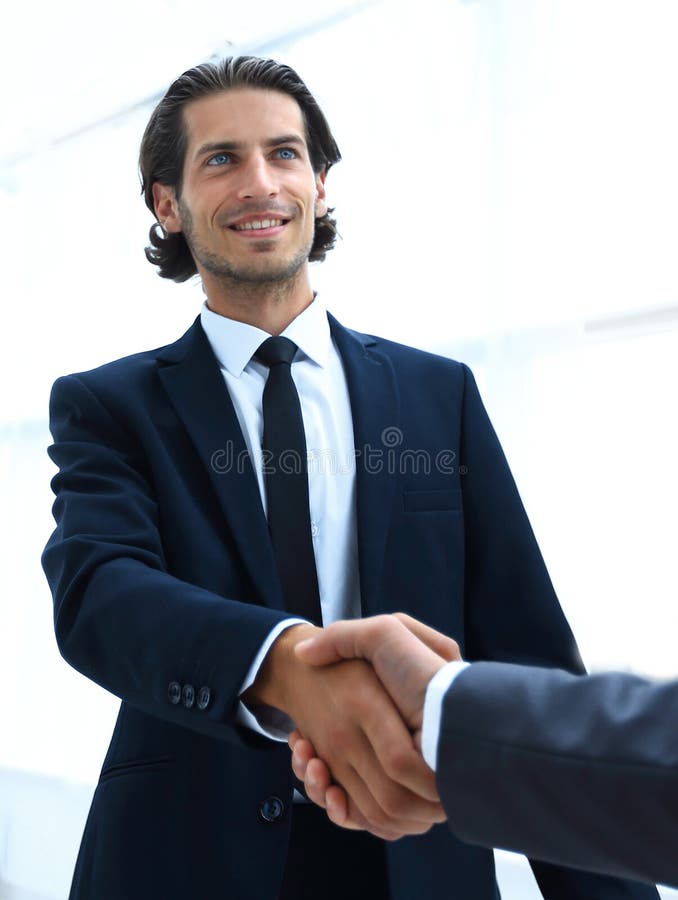 Business Group Welcomes Partner with a Handshake Stock Image - Image of ...