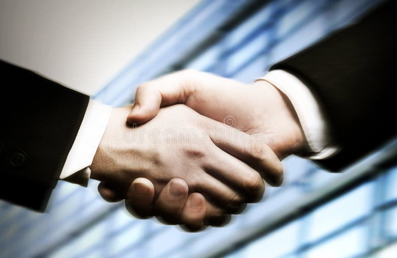Business Hand Shake and a Office in Background Stock Image - Image of ...