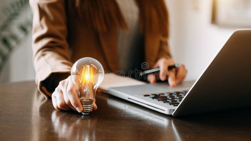 Business Hand Showing Creative Business Strategy with Light Bulb As ...