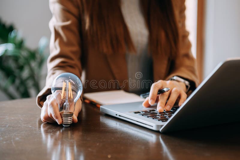 Business Hand Showing Creative Business Strategy with Light Bulb As ...
