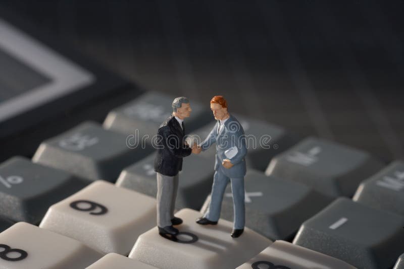 Mini Businessmen on Cellphone Stock Photo - Image of business ...