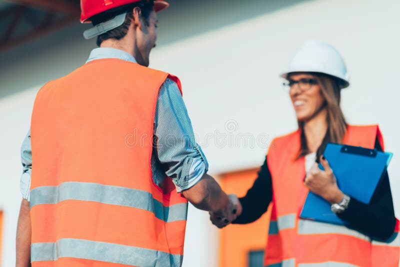 Business Handshake on Construction Site Stock Image - Image of ...