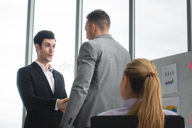 Business Handshake between Corporate Executive Stock Photo - Image of ...