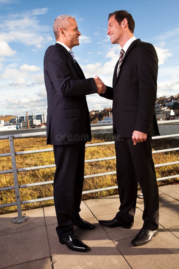 Handshake between Two Businessmen Stock Image - Image of happy, agree ...