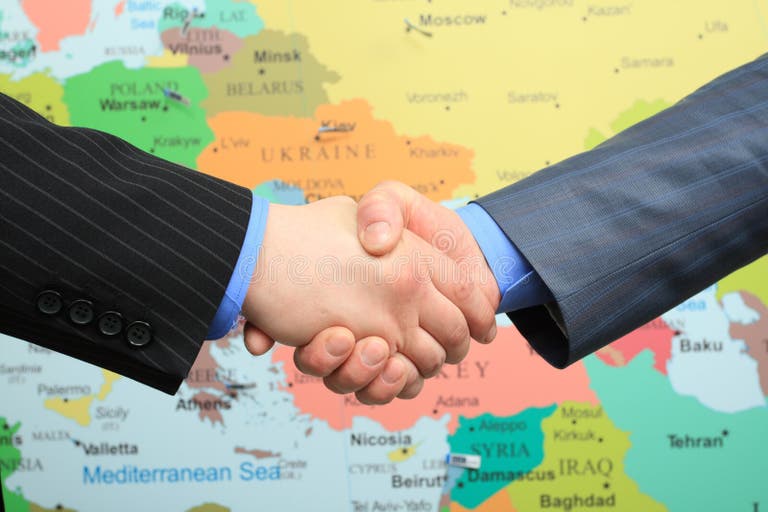 Business Handshake Over World Map Stock Photo - Image of colorful, hard ...
