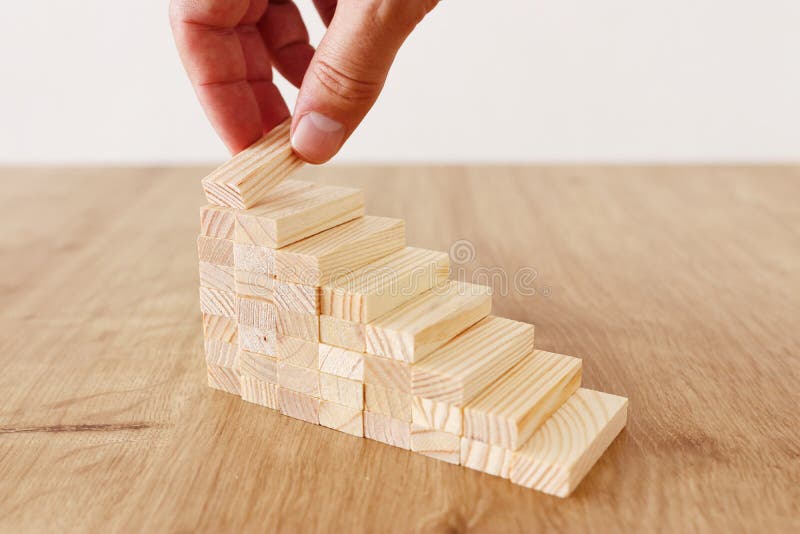 Business Image of Arranging Wood Blocks Stacking As Step Stairs ...