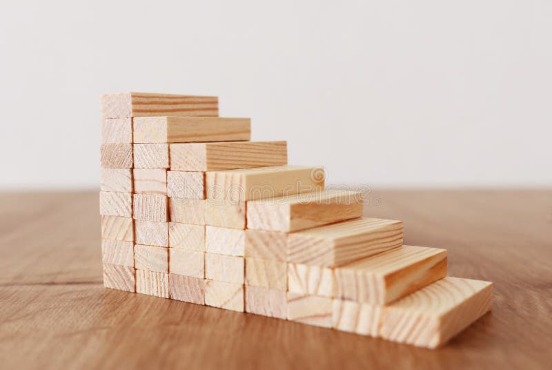 Business Image of Arranging Wood Blocks Stacking As Step Stairs ...