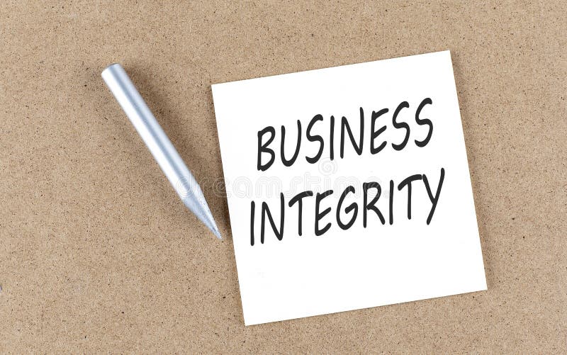 BUSINESS INTEGRITY Text on Sticky Note on a Cork Board with Pencil ...