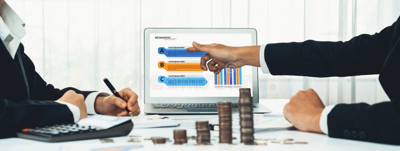 Business Intelligence Analyst Use BI Software on Laptop with Stack Coin ...