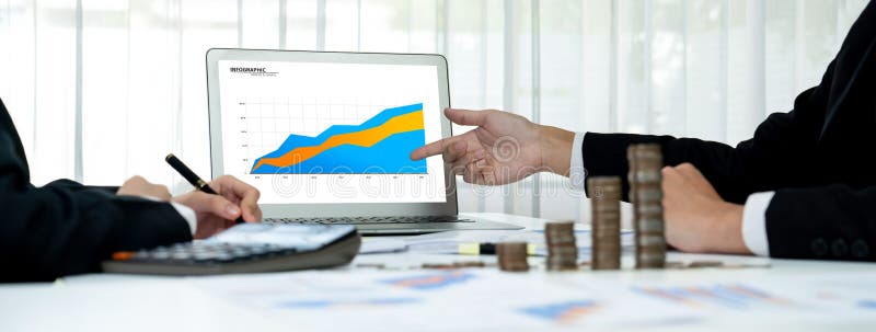 Business Intelligence Analyst Use BI Software on Laptop with Stack Coin ...