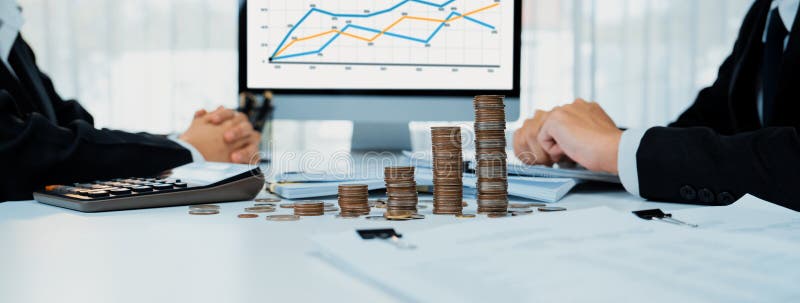 Business Intelligence Analyst Use BI Software on Laptop with Stack Coin ...