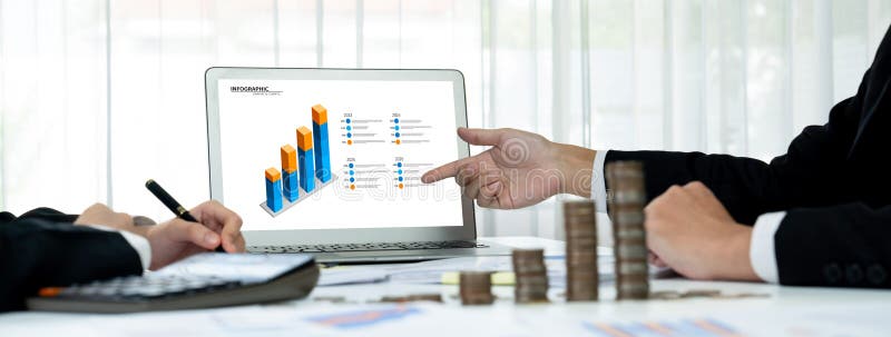 Business Intelligence Analyst Use BI Software on Laptop with Stack Coin ...