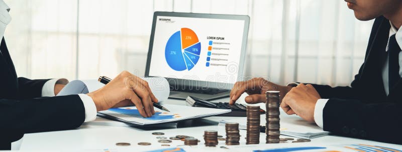 Business Intelligence Analyst Use BI Software on Laptop with Stack Coin ...